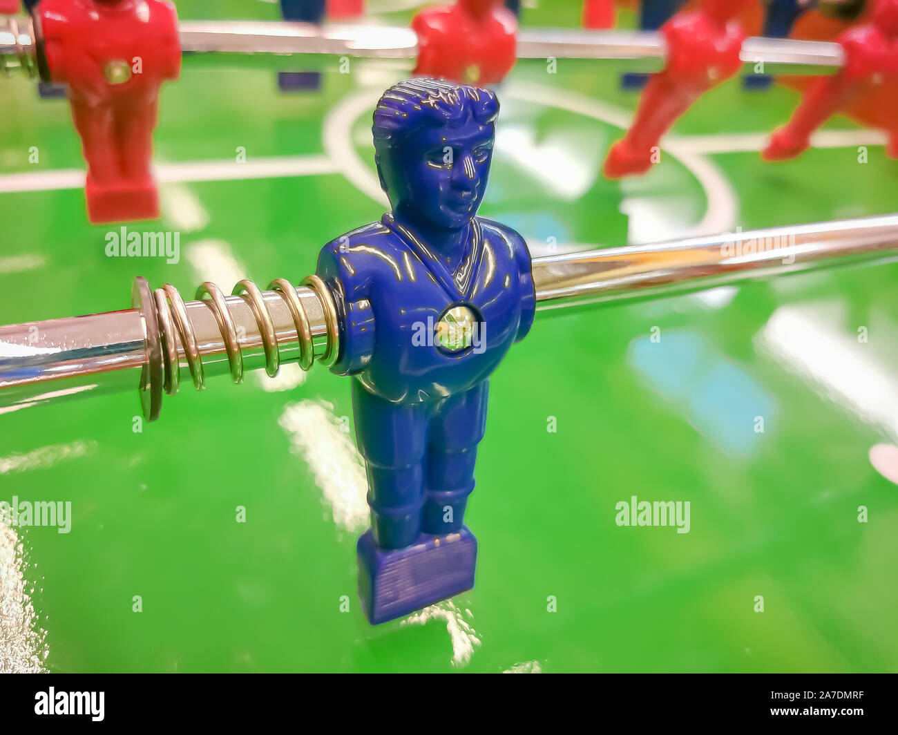 Foosball. Table with red and blue players detail perspective Stock ...