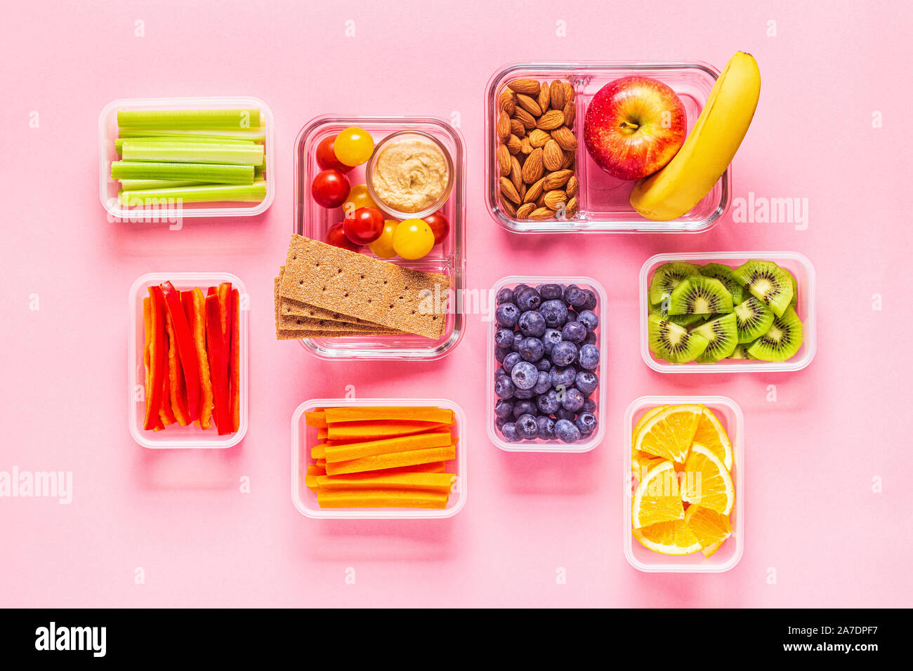 Healthy snack on a pastel background, top view Stock Photo - Alamy