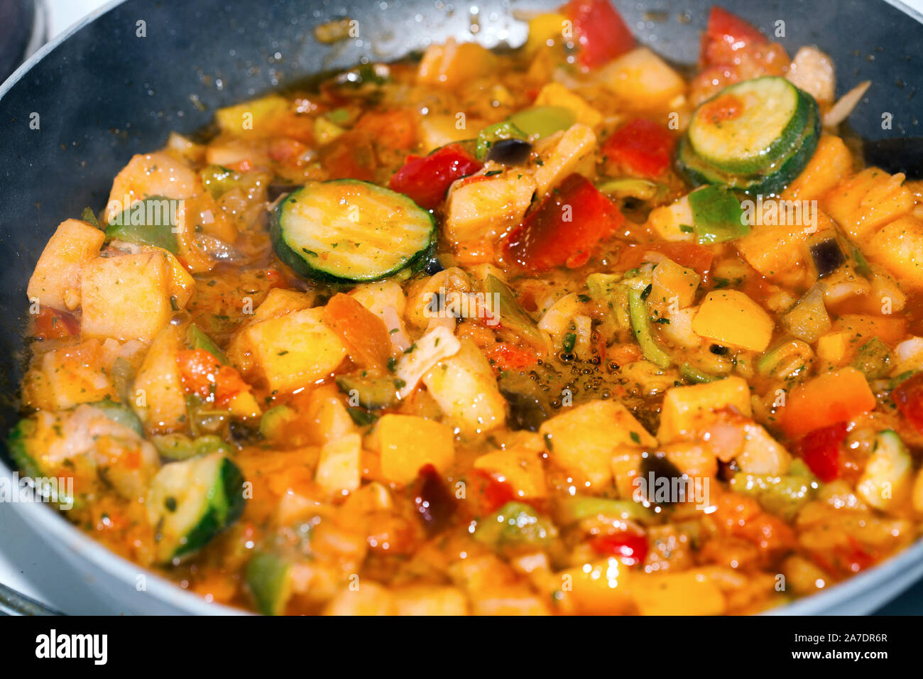 Ratatouille is a French Provencal stewed vegetable dish, originating in ...