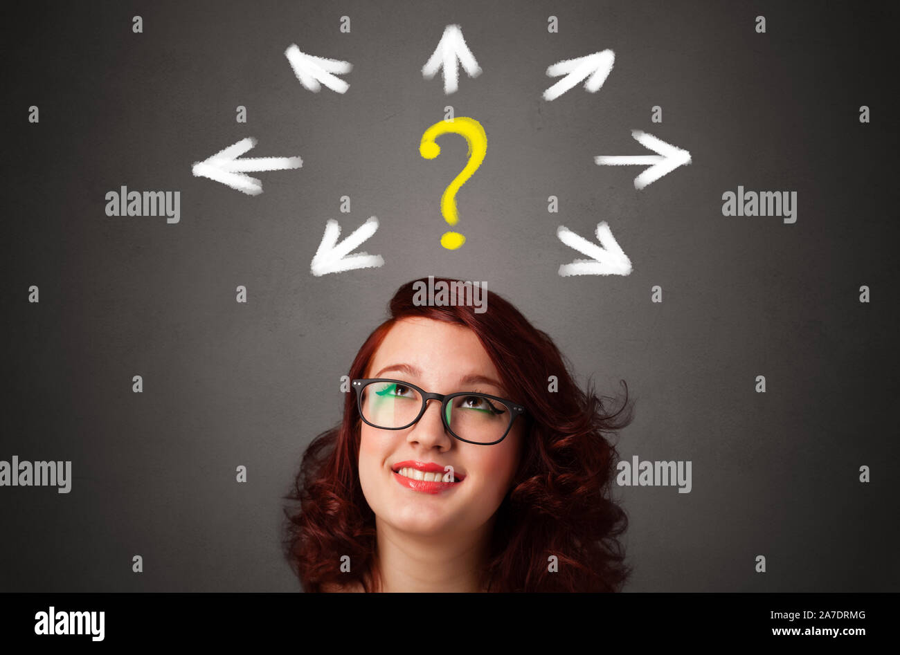 Girl with question marks and direction concept Stock Photo - Alamy