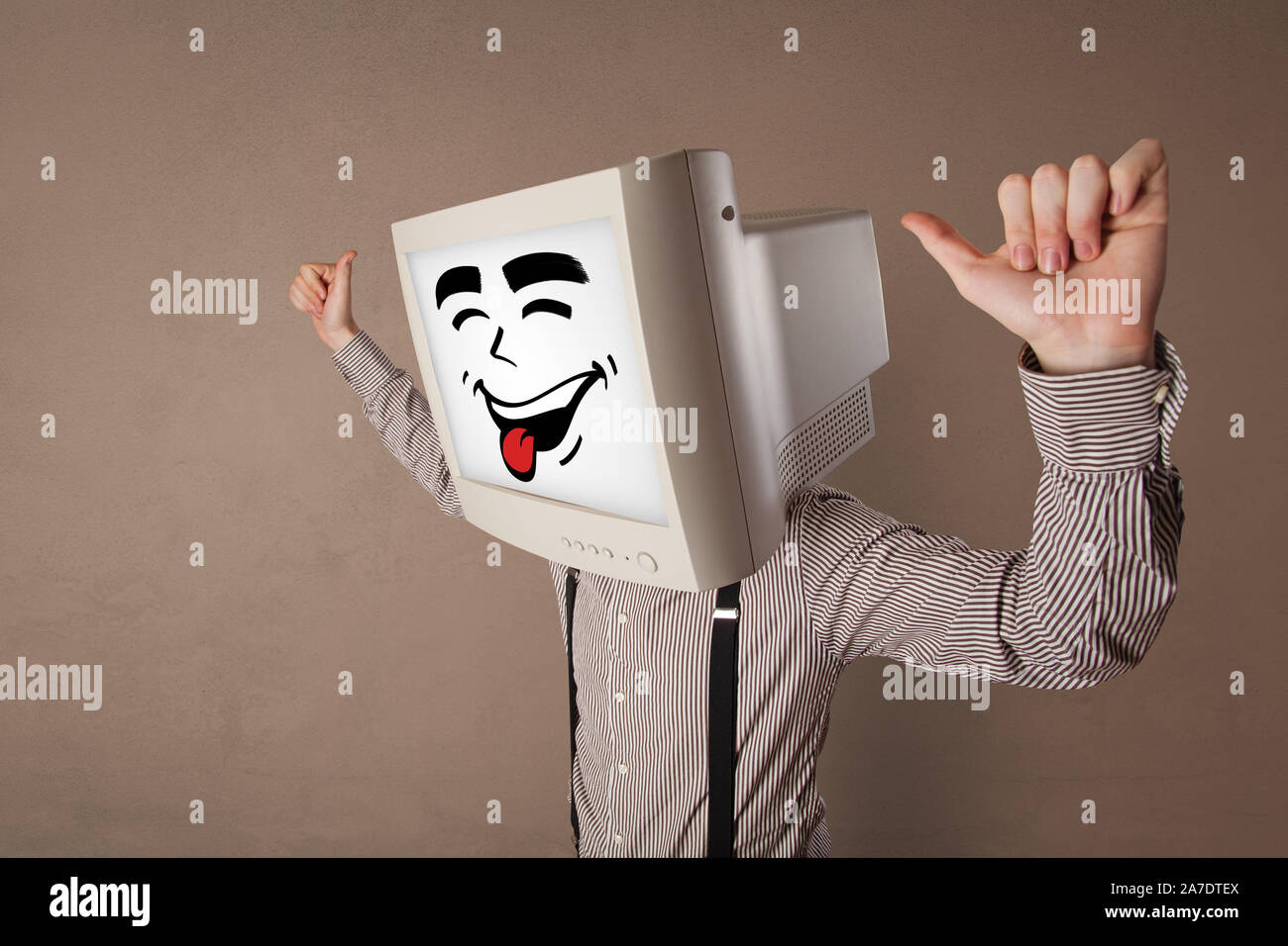 Young person with happy smiley monitor head Stock Photo - Alamy