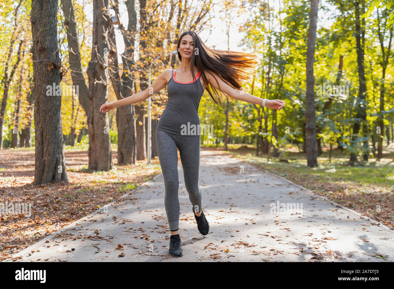 Beautiful woman beginning her morning exercises outside Stock Photo - Alamy
