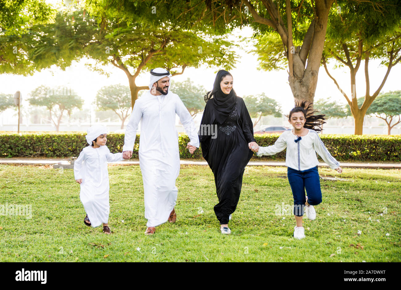 Happy family spending time together outdoor in Dubai Stock Photo - Alamy