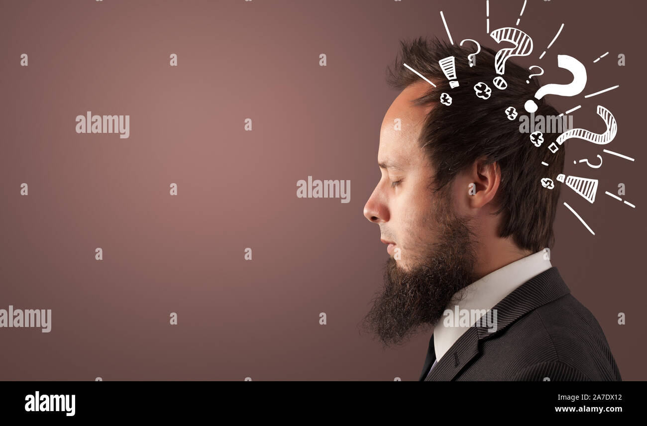 Head with white question marks, and copy space Stock Photo - Alamy