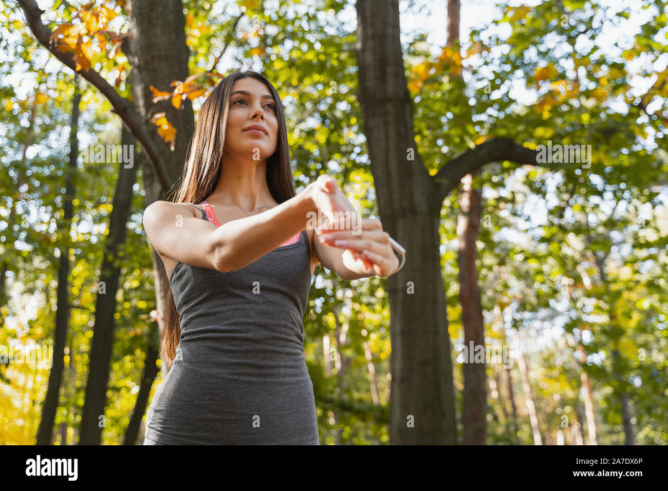 Beautiful woman beginning her new set of exercises Stock Photo - Alamy