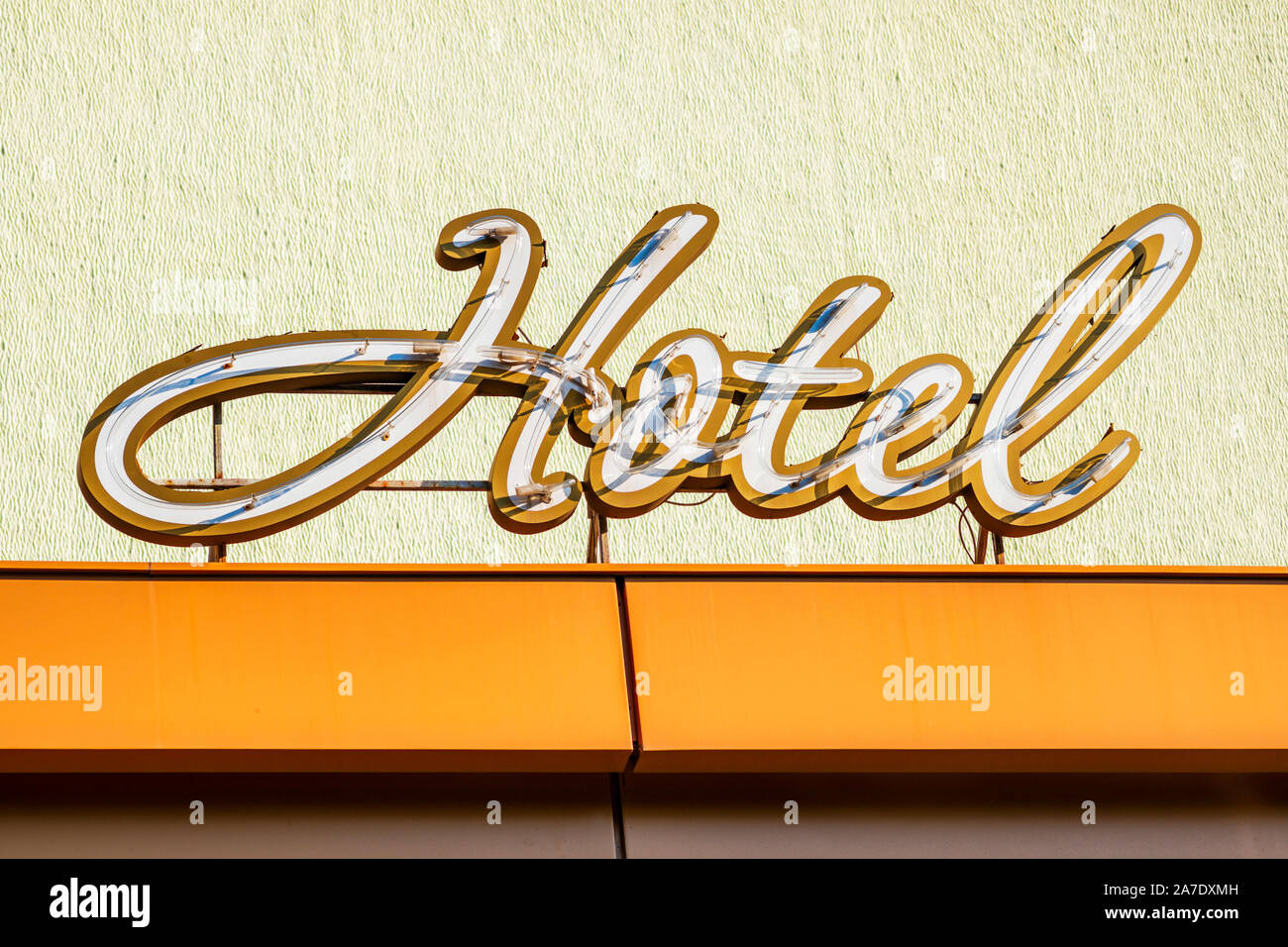 Signboard of a hotel. Hotel word with golden letters on hotel Stock ...