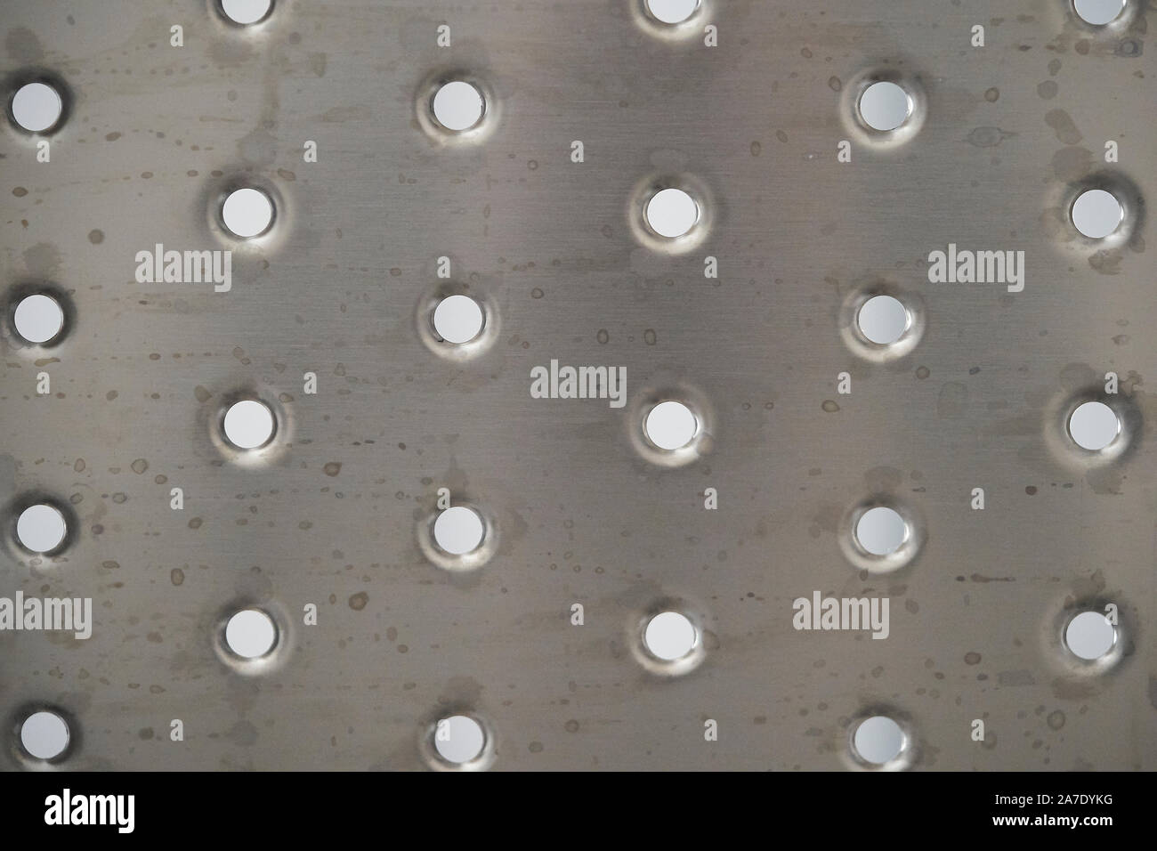 Dark metal texture background holes hi-res stock photography and images ...