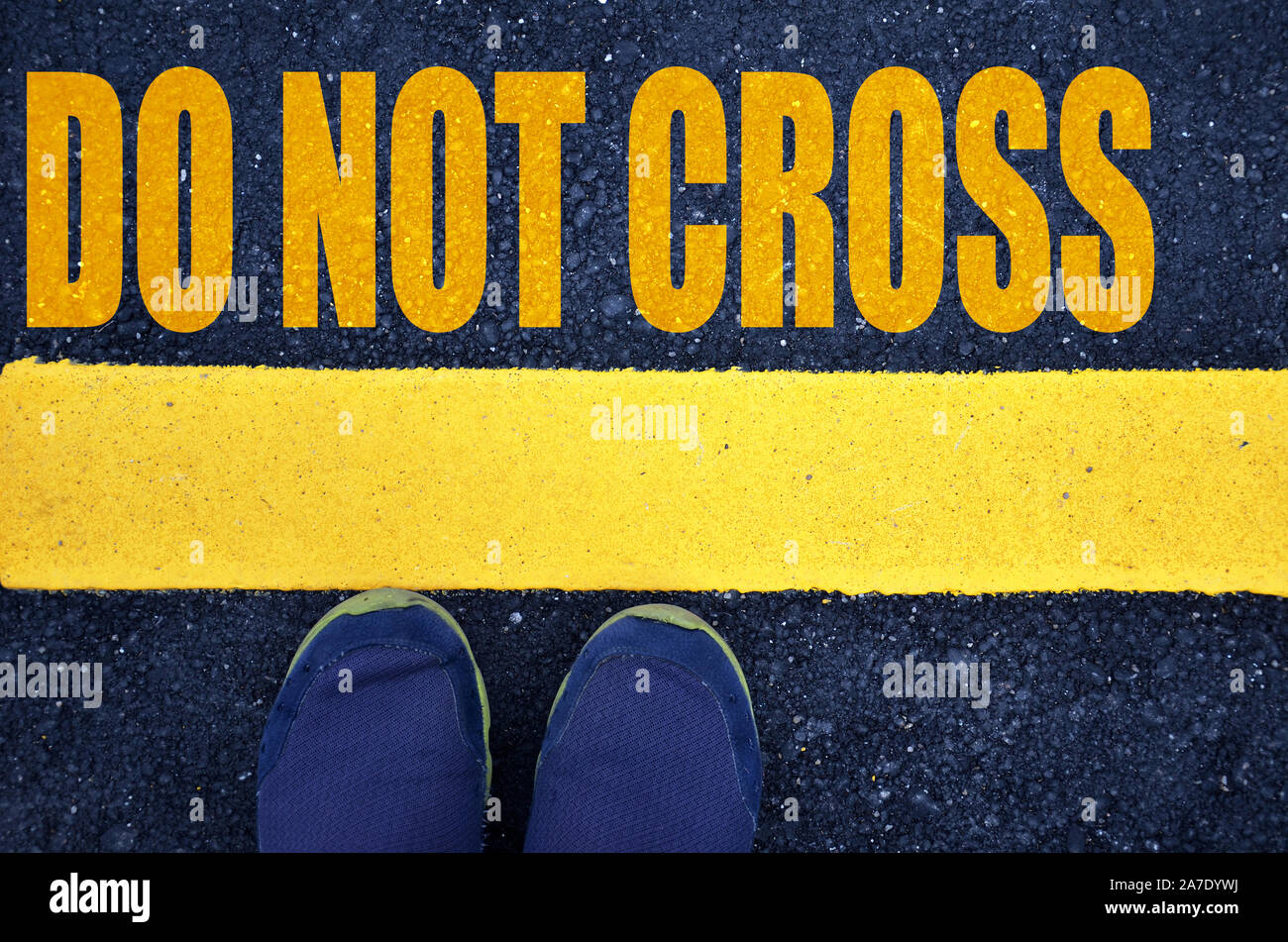 Do not cross with yellow print, 3D rendering Stock Photo - Alamy