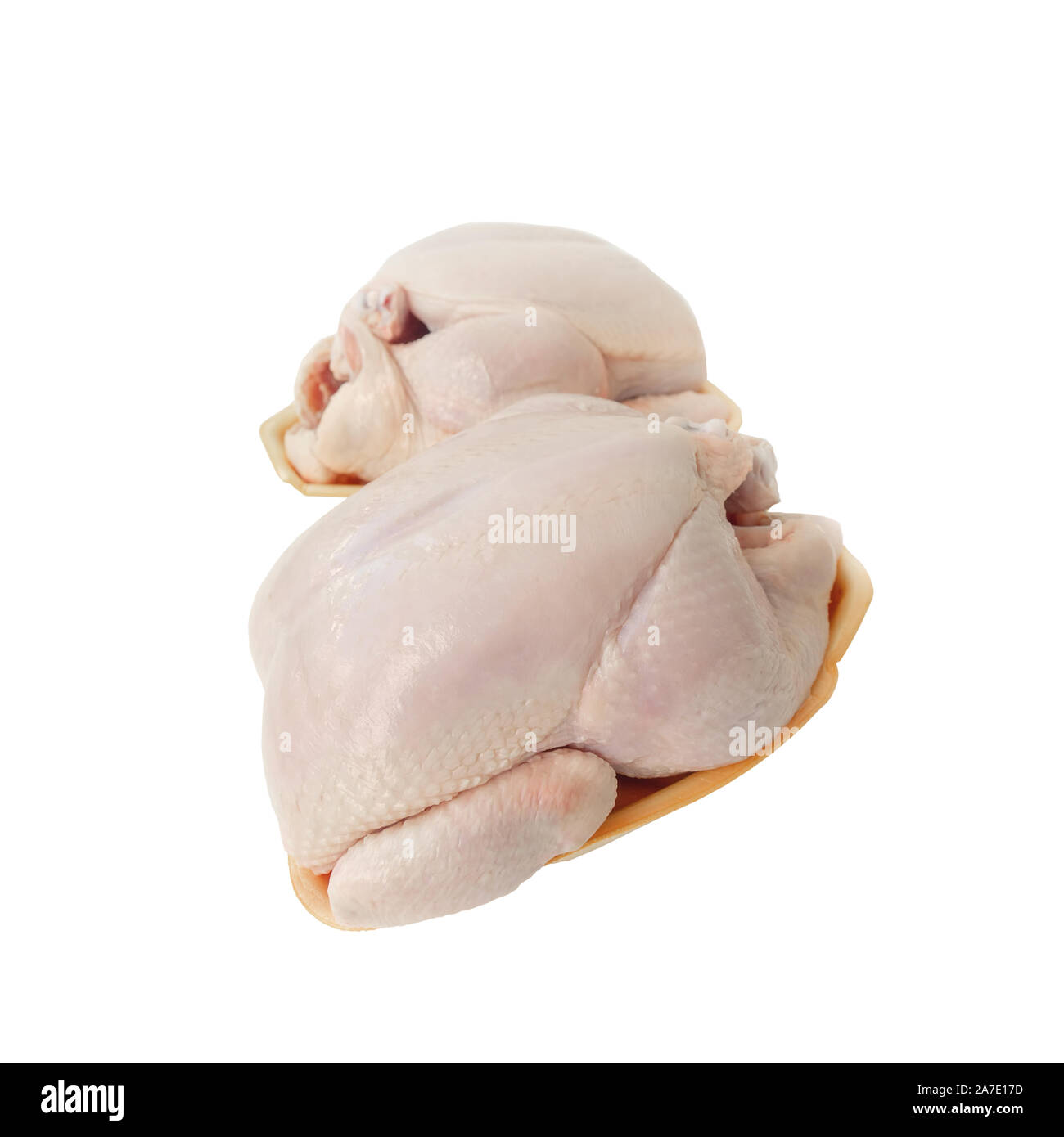 Decapitated peeled chicken carcass for frying close-up on a white ...