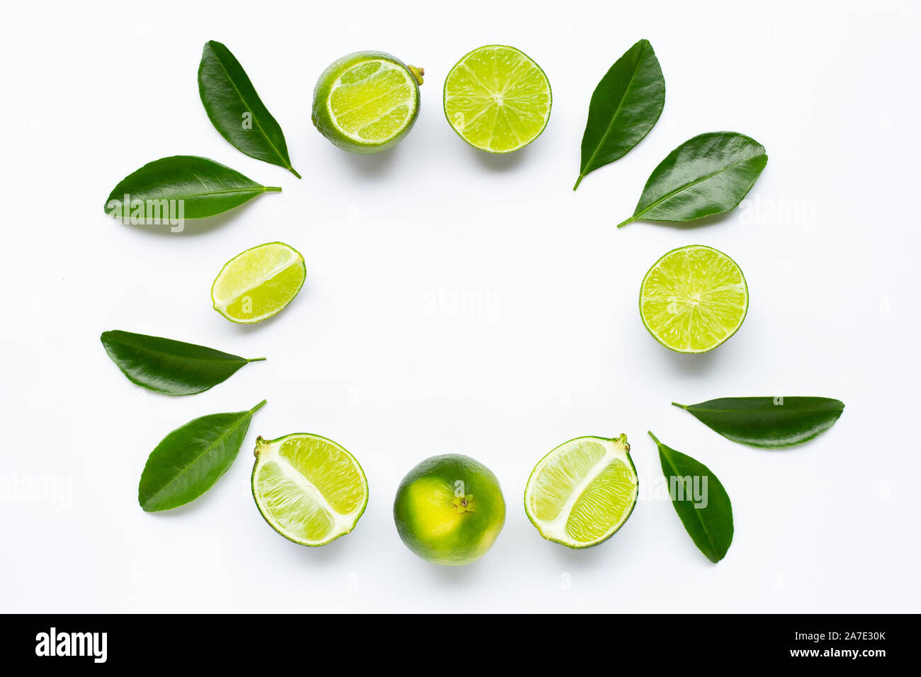 Frame made of Limes with leaves isolated on white background Stock ...