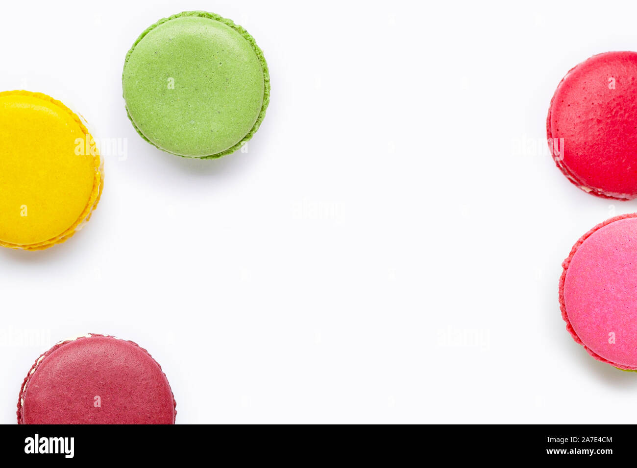 Colorful macarons isolated on white background Stock Photo - Alamy