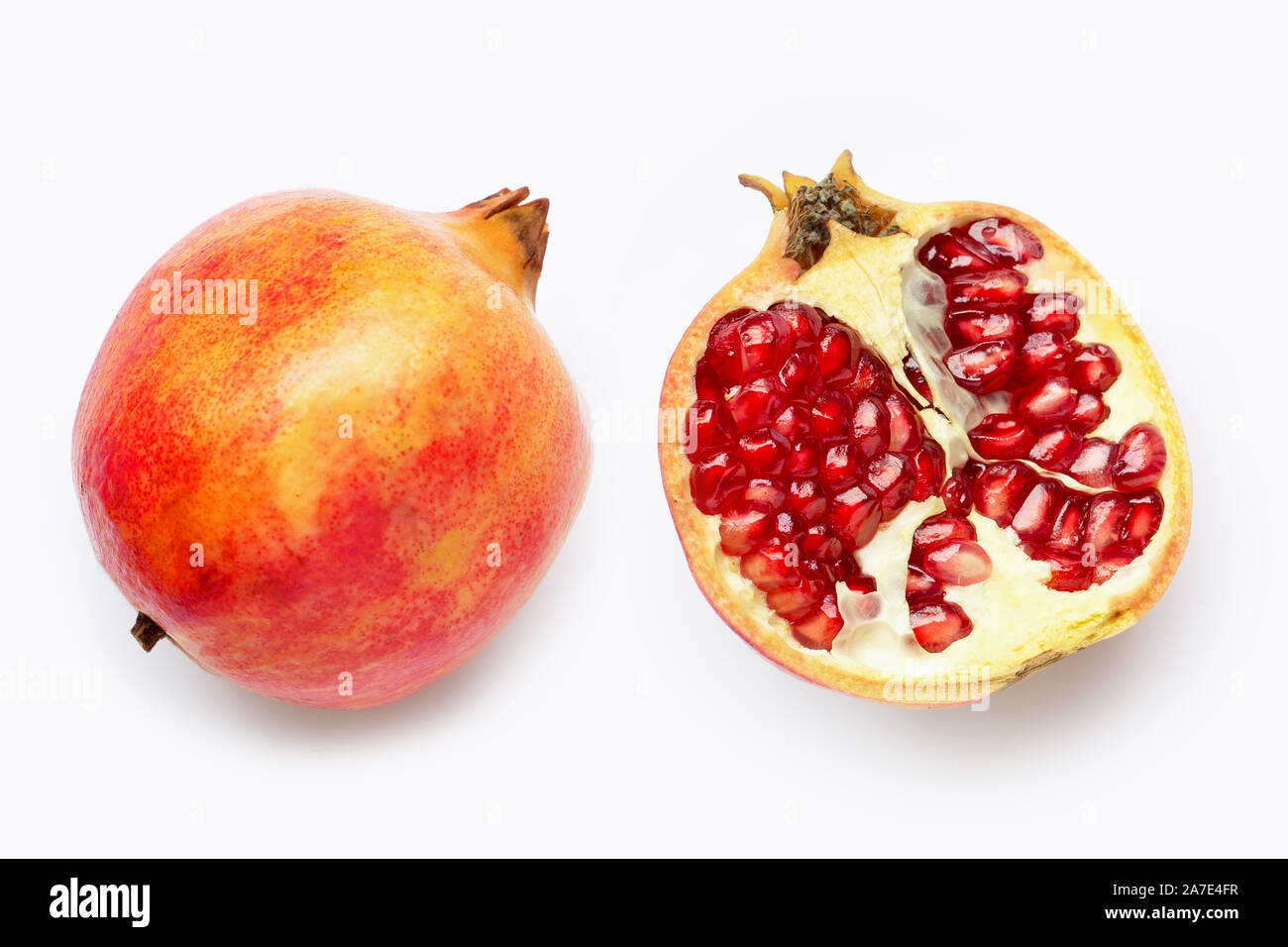 Pomegranate isolated on white background. Top view Stock Photo - Alamy