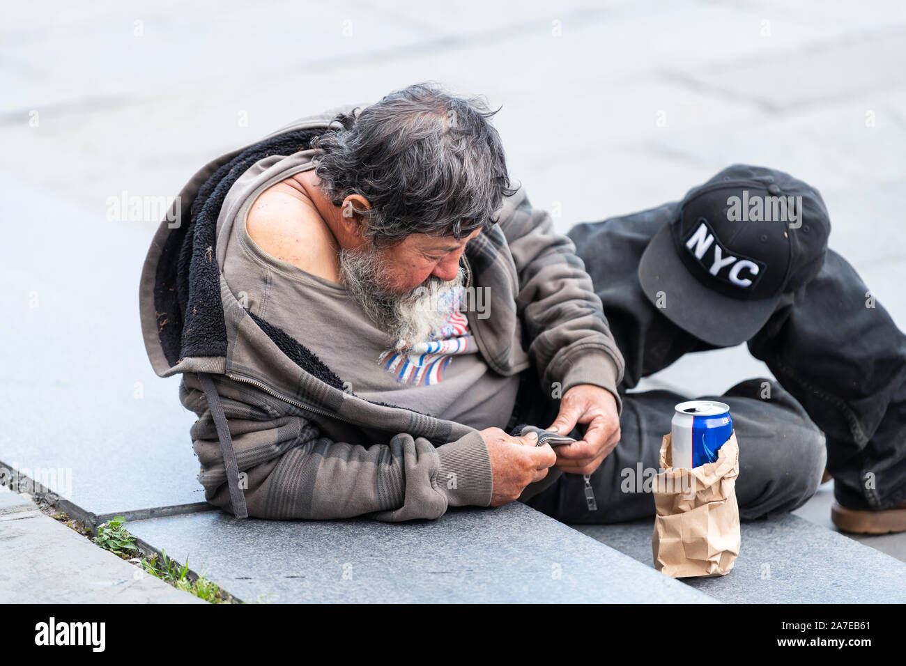 Homeless people sleeping on floor hi-res stock photography and images ...