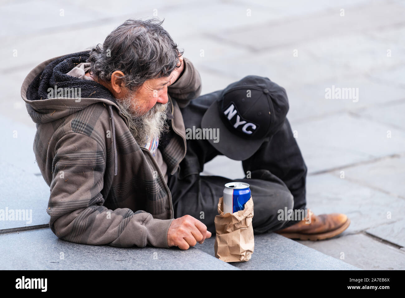 New Orleans, USA - April 23, 2018: People person homeless man lying ...