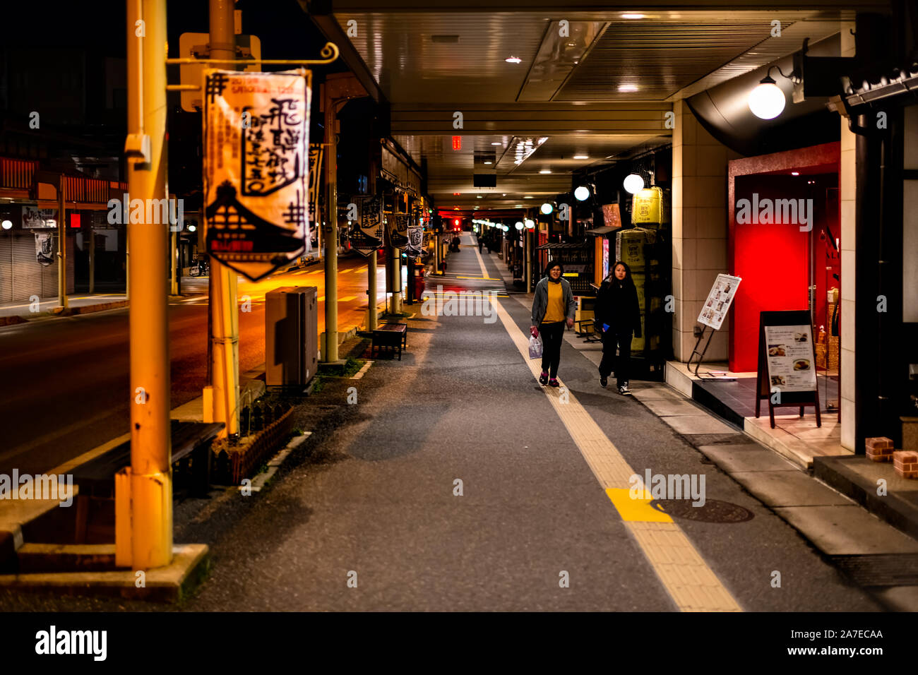 Takayama, Japan - April 8, 2019: Small town shops stores people walking ...
