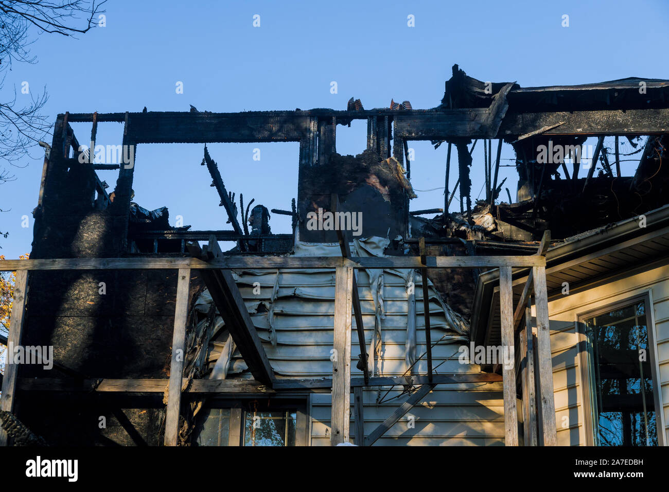 House after a fire view of a burnt building in the area Stock Photo - Alamy