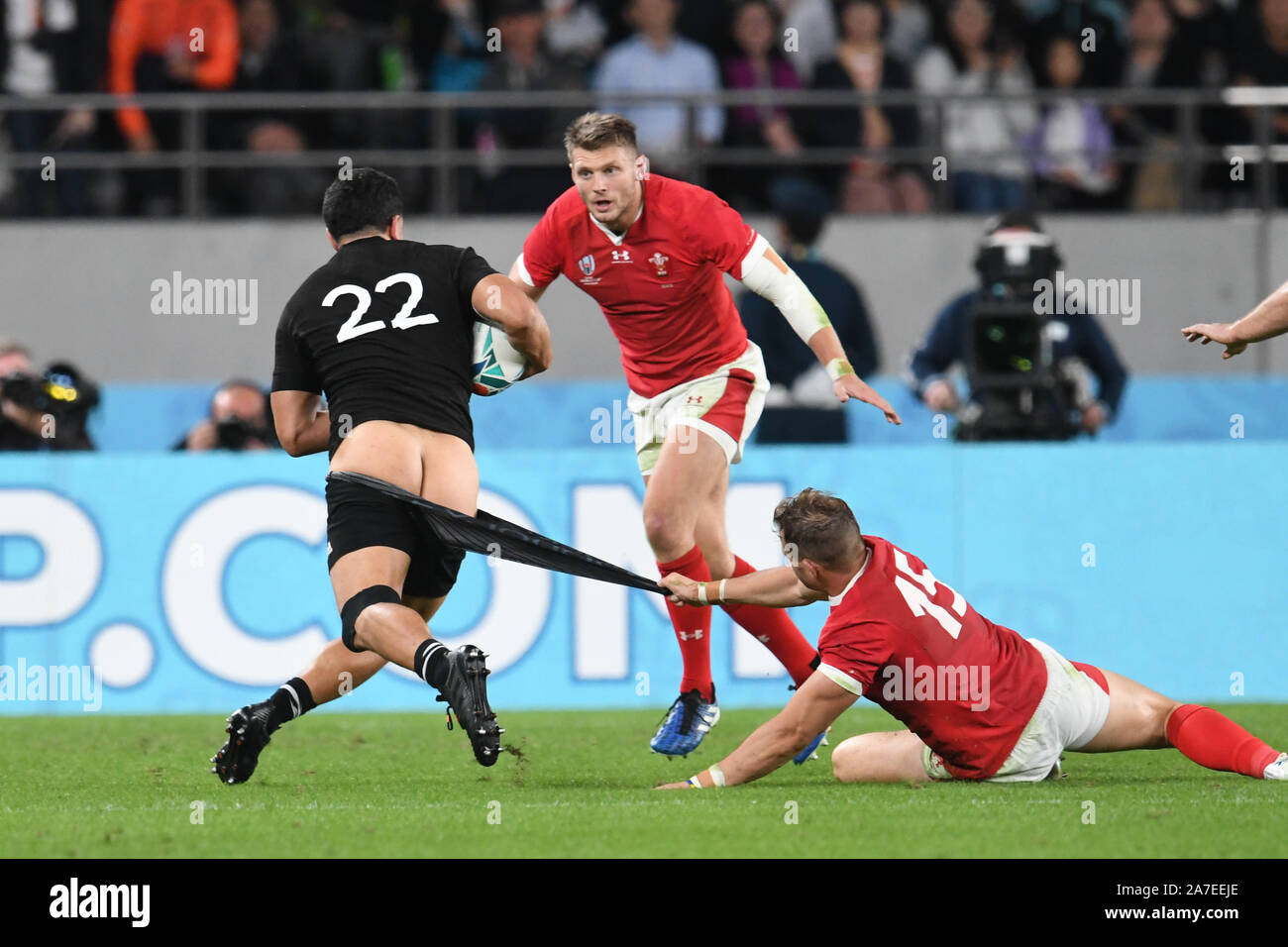 Anton Lienert-Brown of New Zealand and Hallam Amos of Wales during the ...