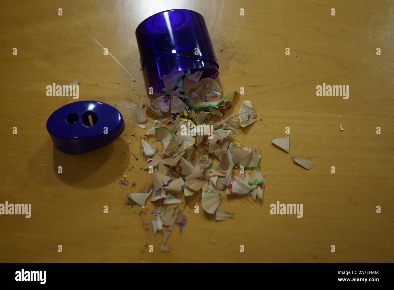 Pencil sharpener with shavings Stock Photo - Alamy