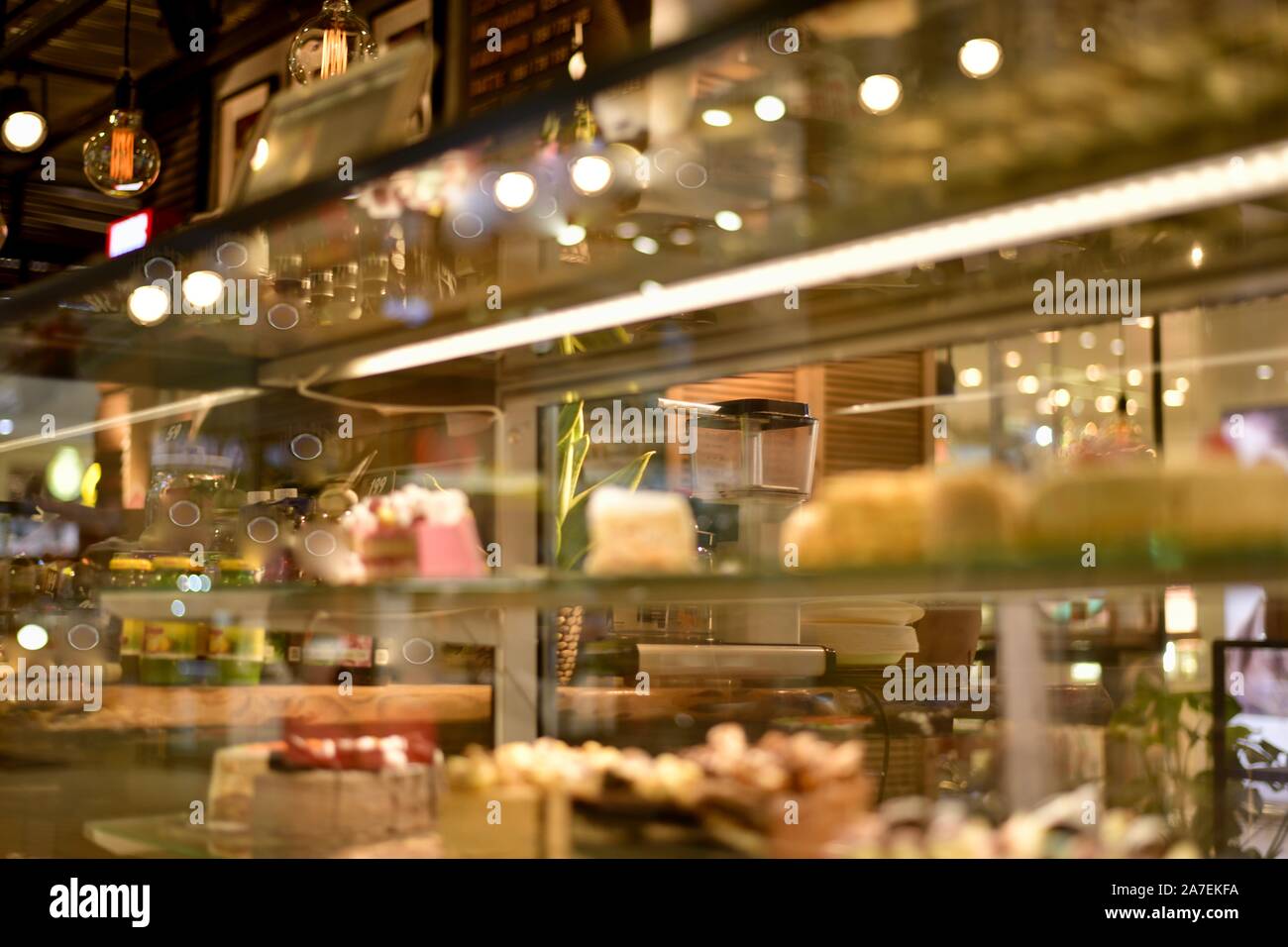 Bar with dim cozy lighting, shop window lights Stock Photo - Alamy