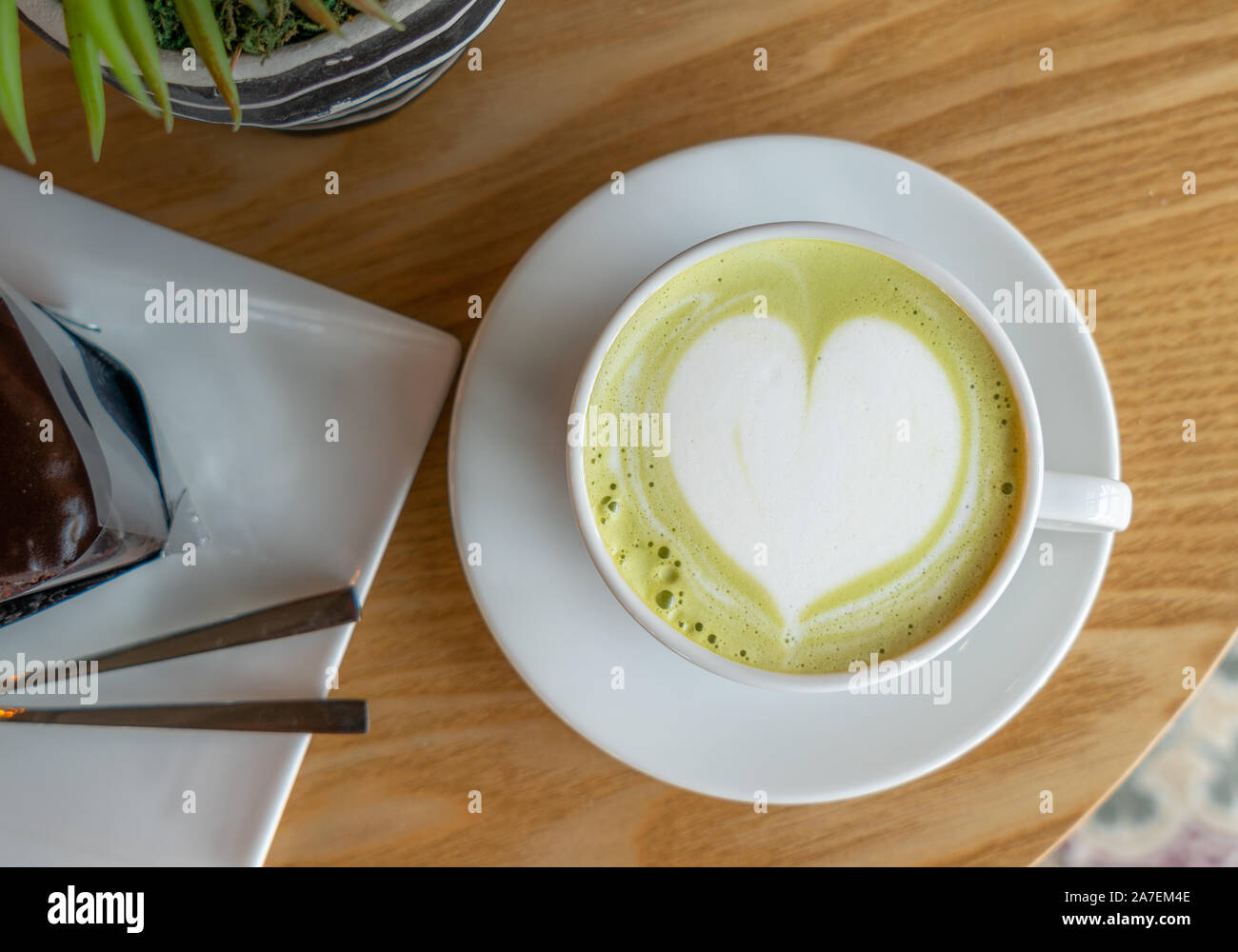 Top view a cup of green tea with decoration in heart shape Stock Photo ...