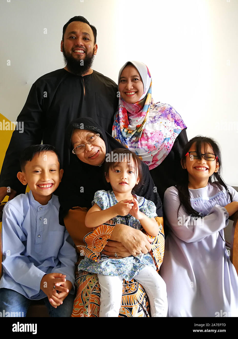 Muslim family taking portrait on the Hari Raya morning Stock Photo - Alamy