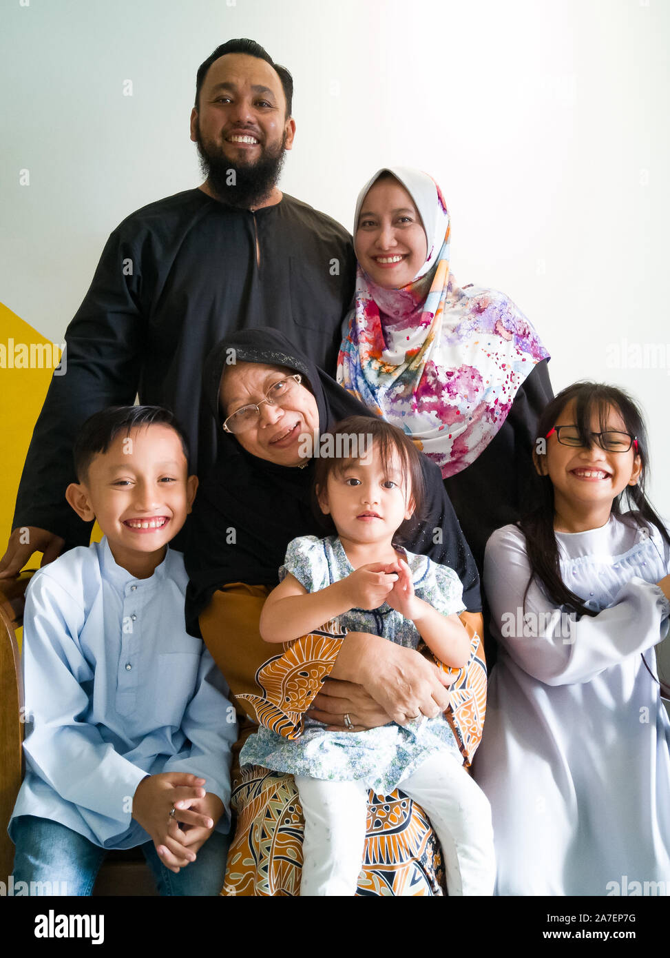 Muslim family taking portrait on the Hari Raya morning Stock Photo - Alamy