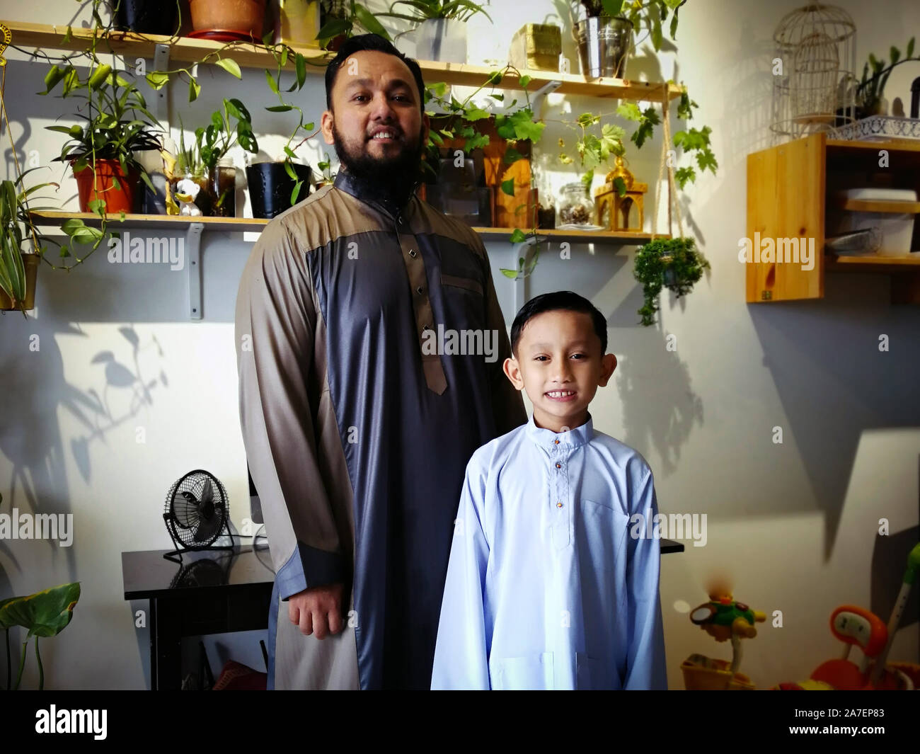 Portrait of asian father and son on hari raya morning Stock Photo - Alamy