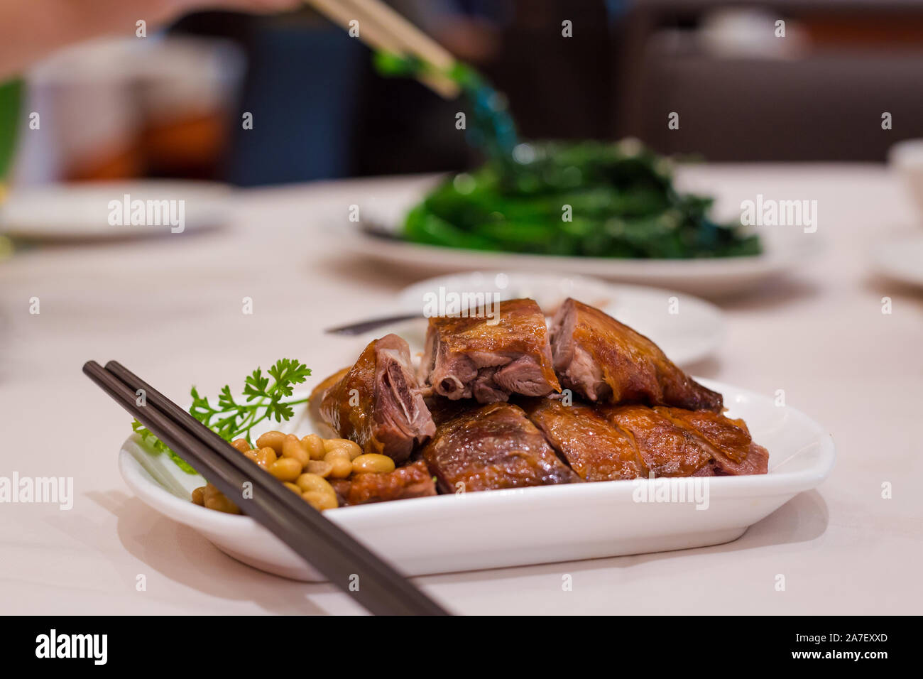 A delicious plate of bbq duck at a Chinese dim sum restaurant Stock ...
