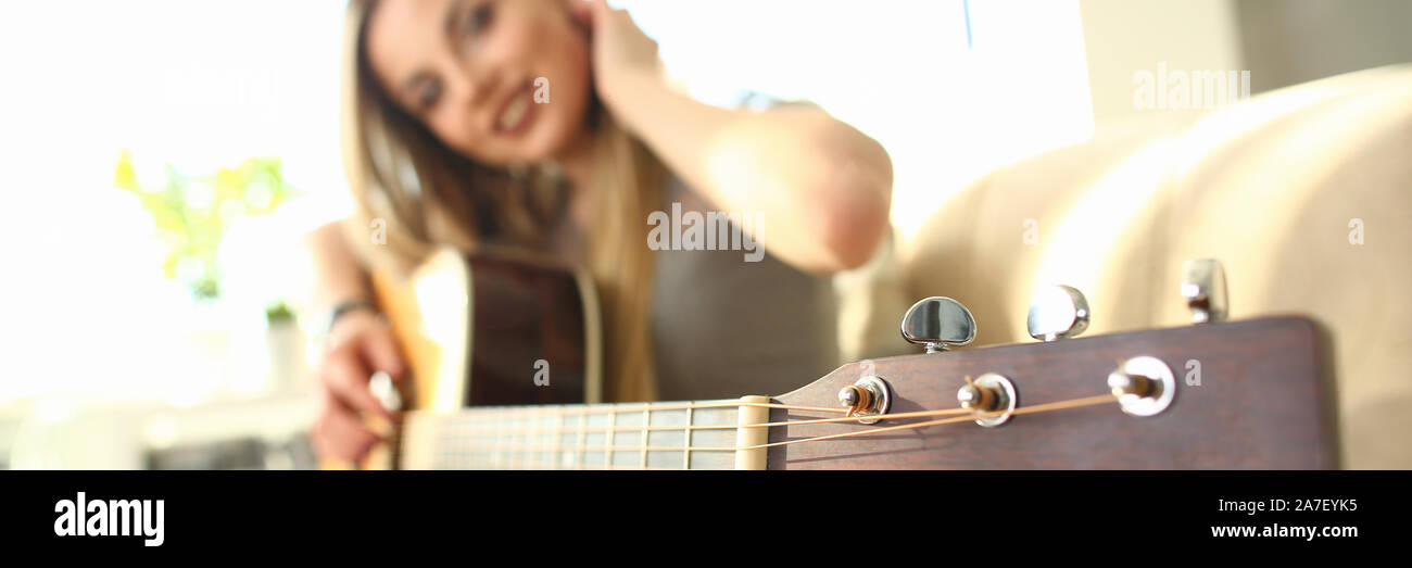 Female Bass Guitarist Performing Music at Home Stock Photo - Alamy