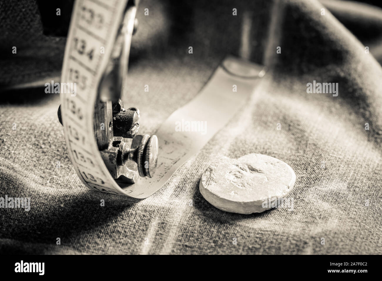 Old sewing machine with tailor tape, scissors and threads Stock Photo ...