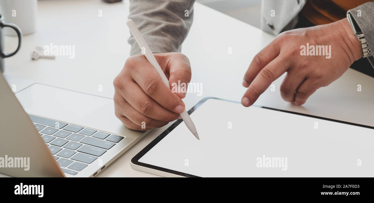 Close-up view of professional businessman writing his idea on blank ...