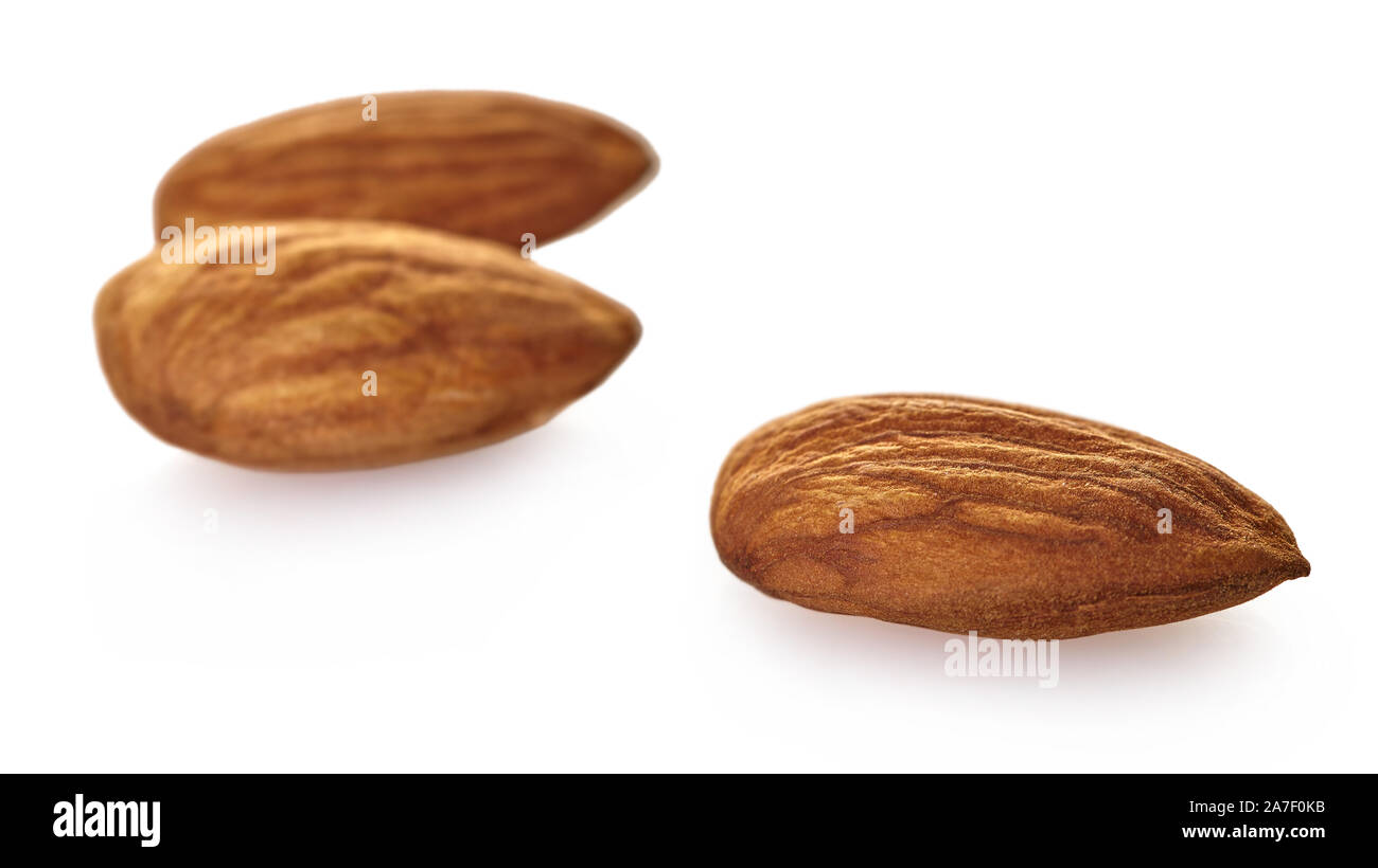 almond nut close-up on a white isolated background Stock Photo - Alamy