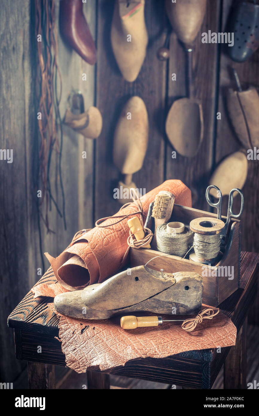 Vintage workplace to making shoes of leather and threads Stock Photo ...