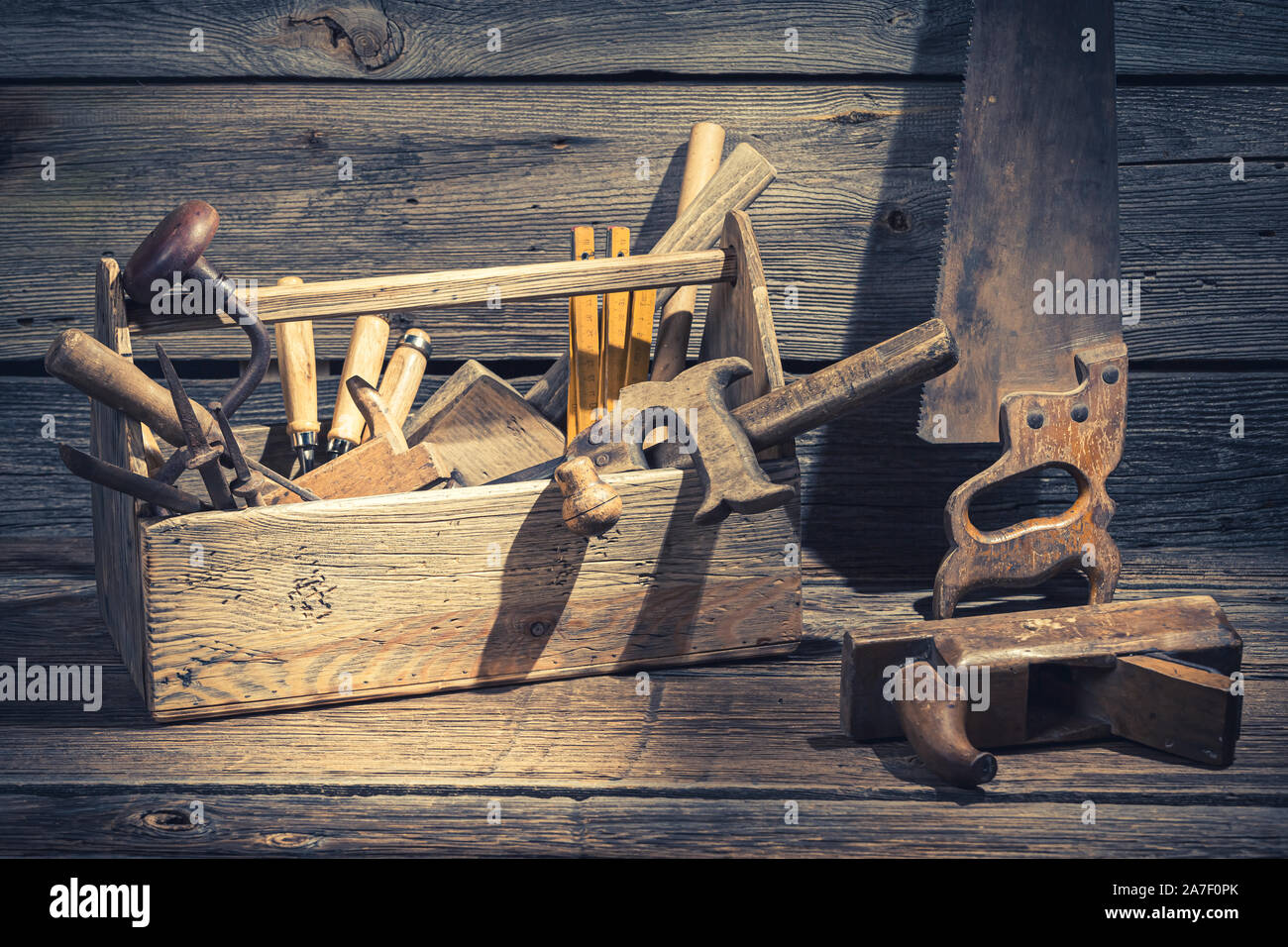 Closeup of joinery tool box in rustic wooden shed Stock Photo - Alamy