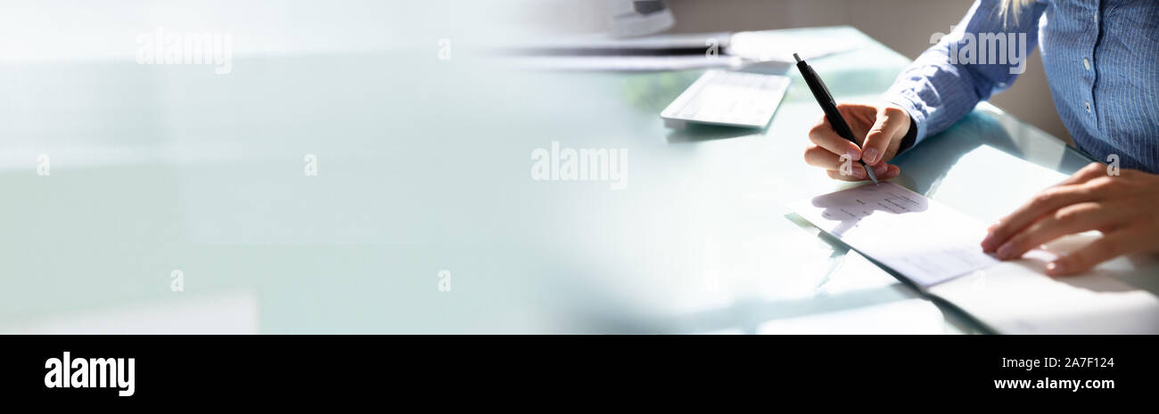 Signing cheques hi-res stock photography and images - Alamy