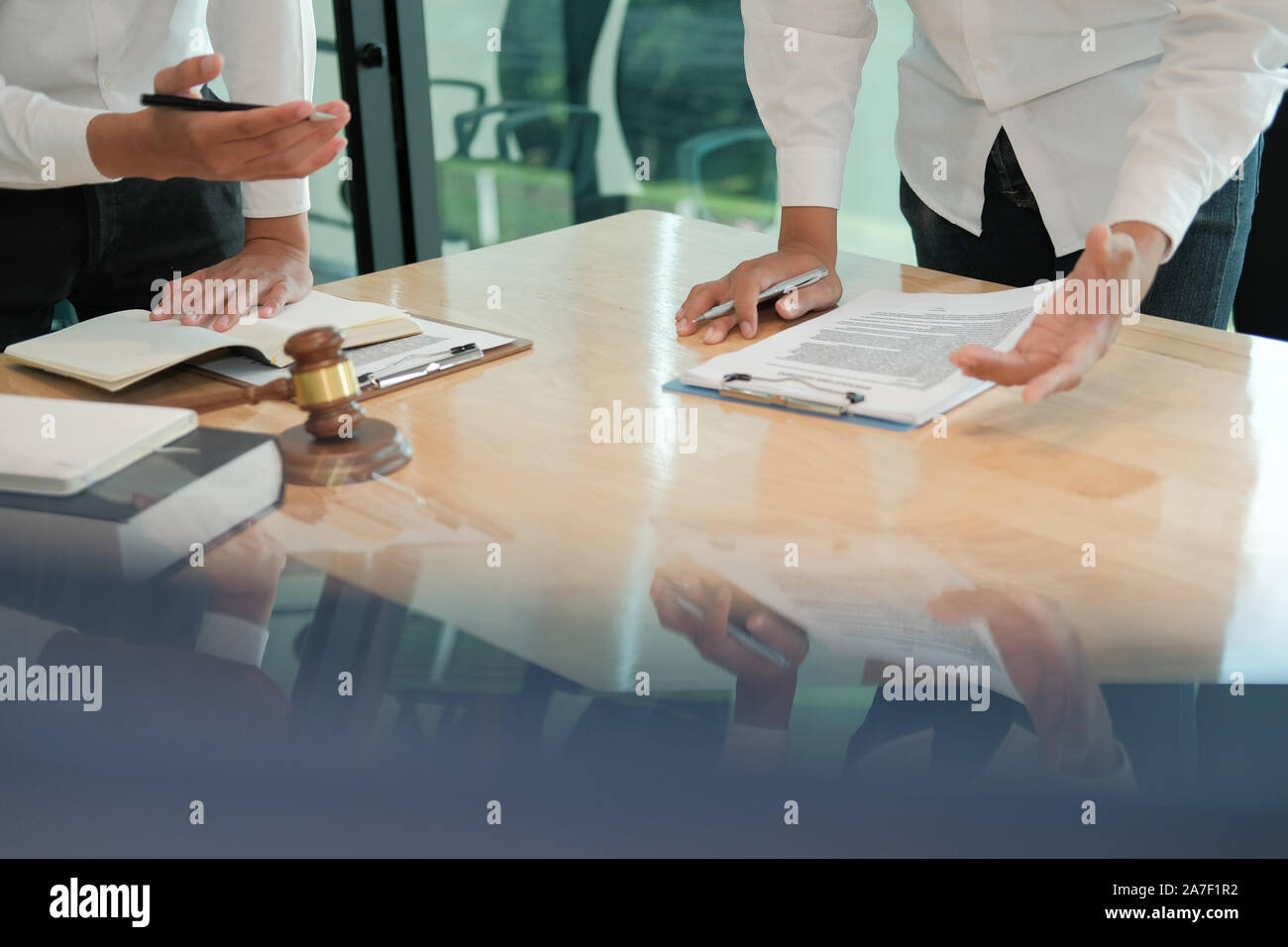 lawyer giving advice to a man. businessman discussing legal legislation ...