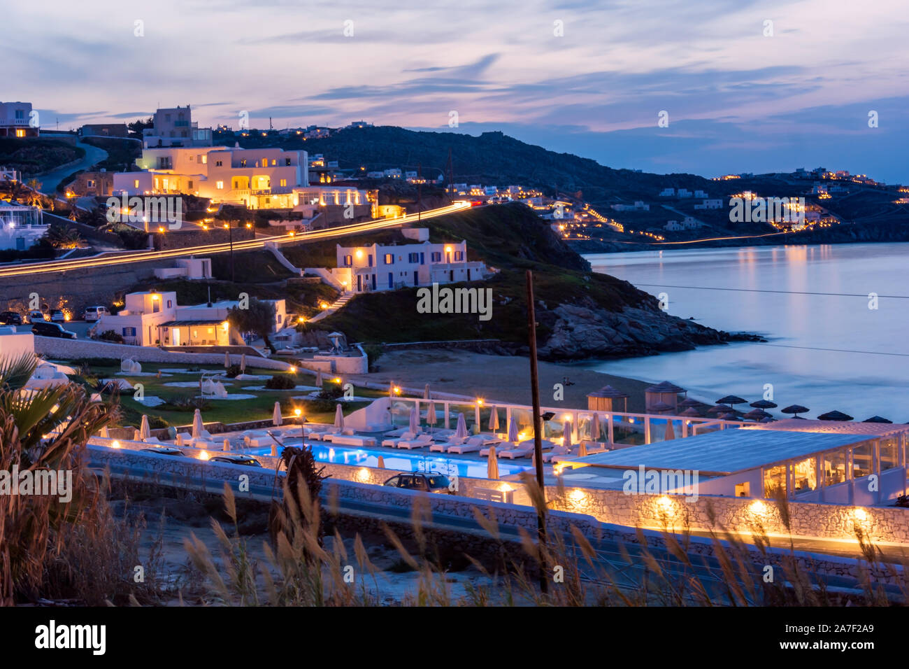 Beautiful blue hour on the beach side in Greece Stock Photo - Alamy