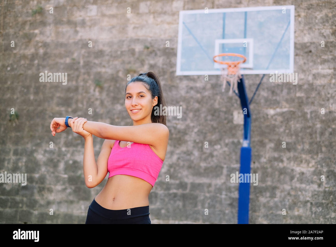 Fitness tracker watch on fit girls wrist Stock Photo - Alamy
