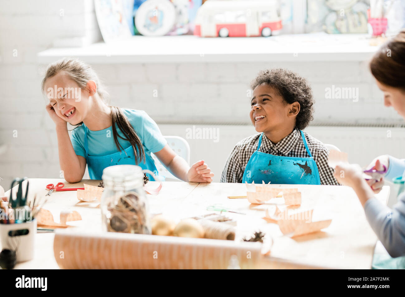 Children laughing teacher classroom hi-res stock photography and images ...