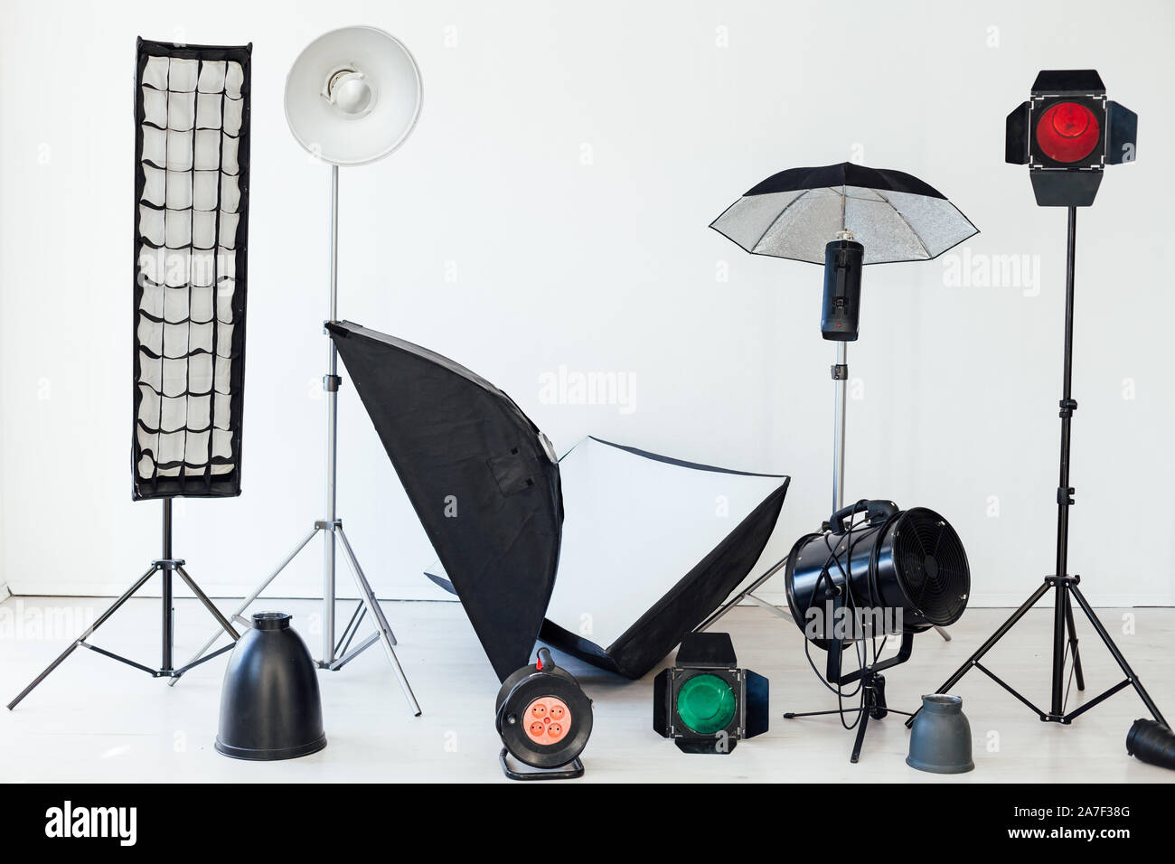 Photo studio equipment flash accessories photographer on a white ...