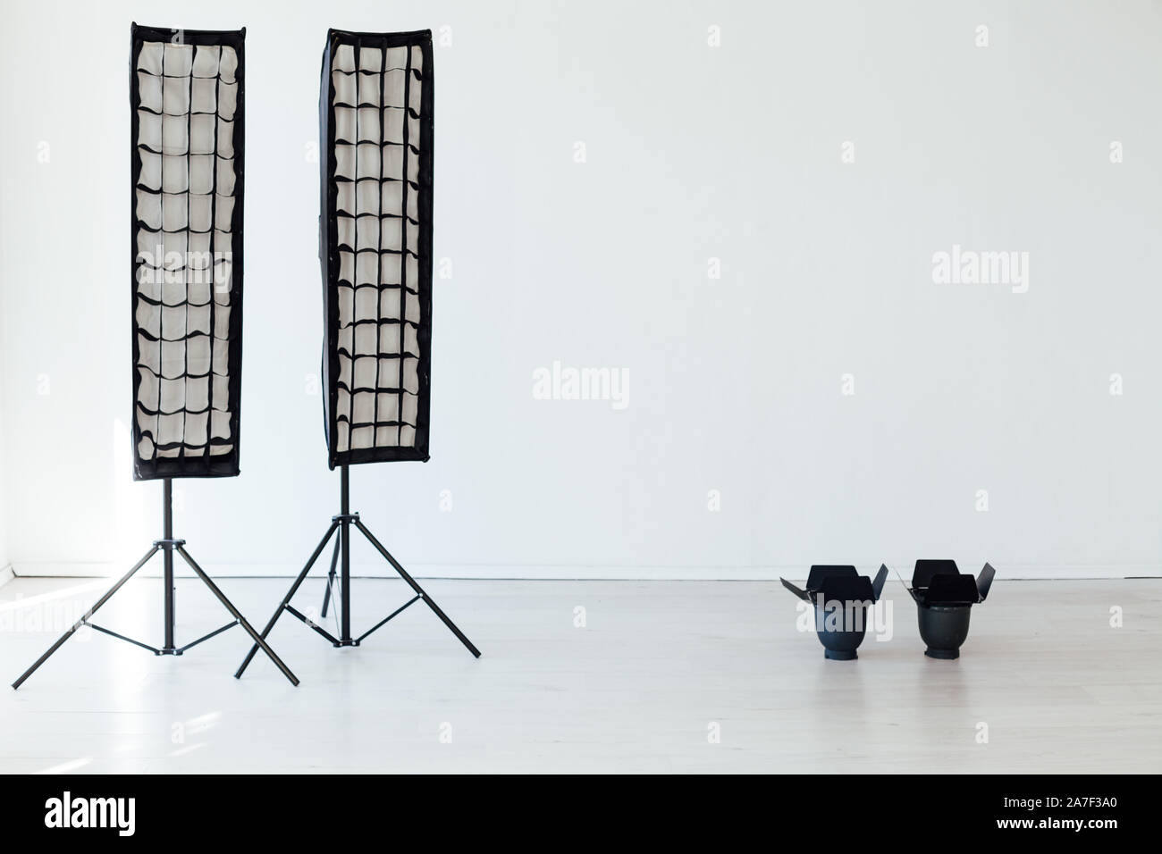 Photo studio equipment flash accessories photographer on a white ...