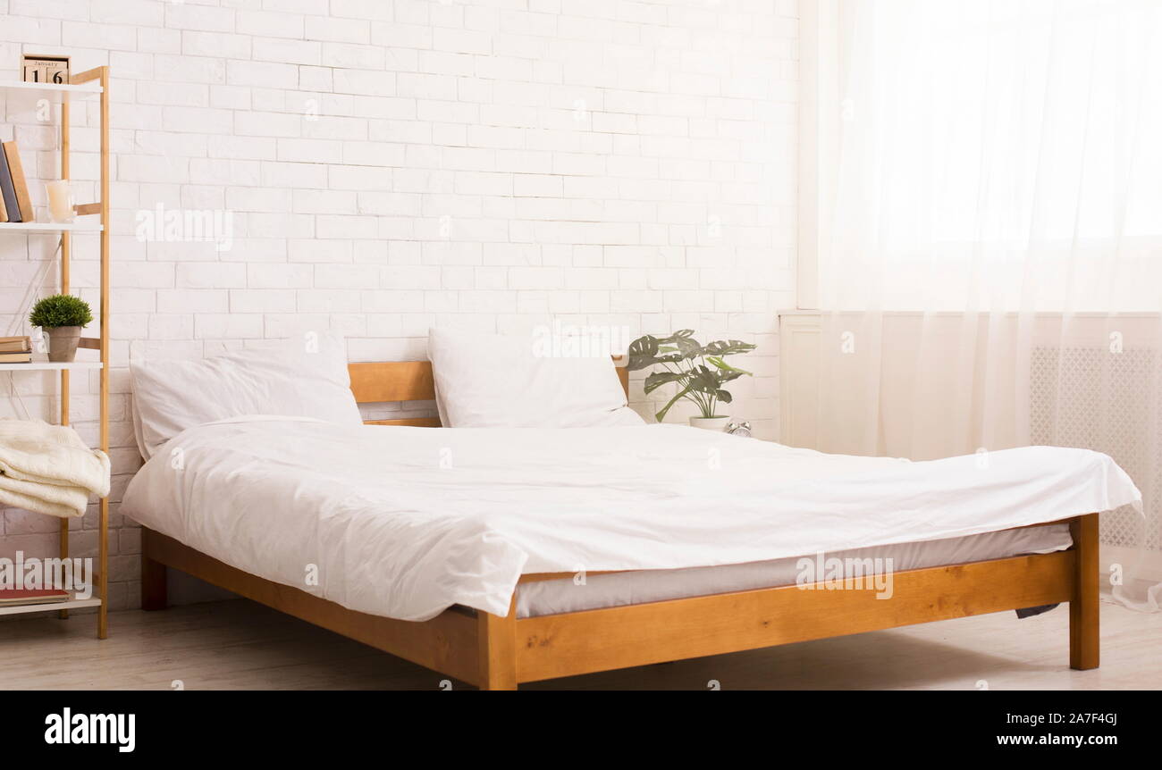 Comfortable bedroom interior with bed, empty space Stock Photo - Alamy