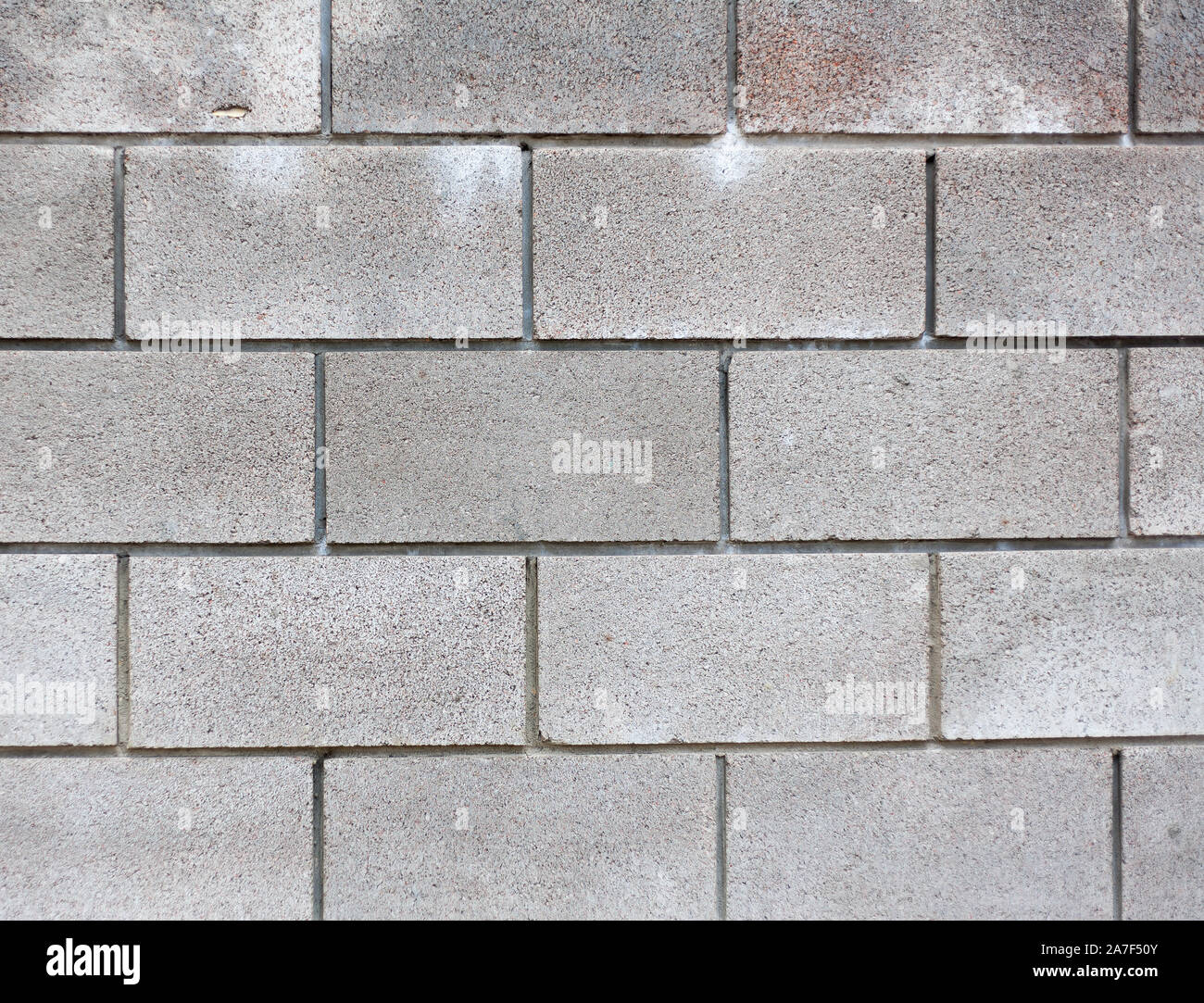 Modern grey brick wall for background or texture Stock Photo - Alamy