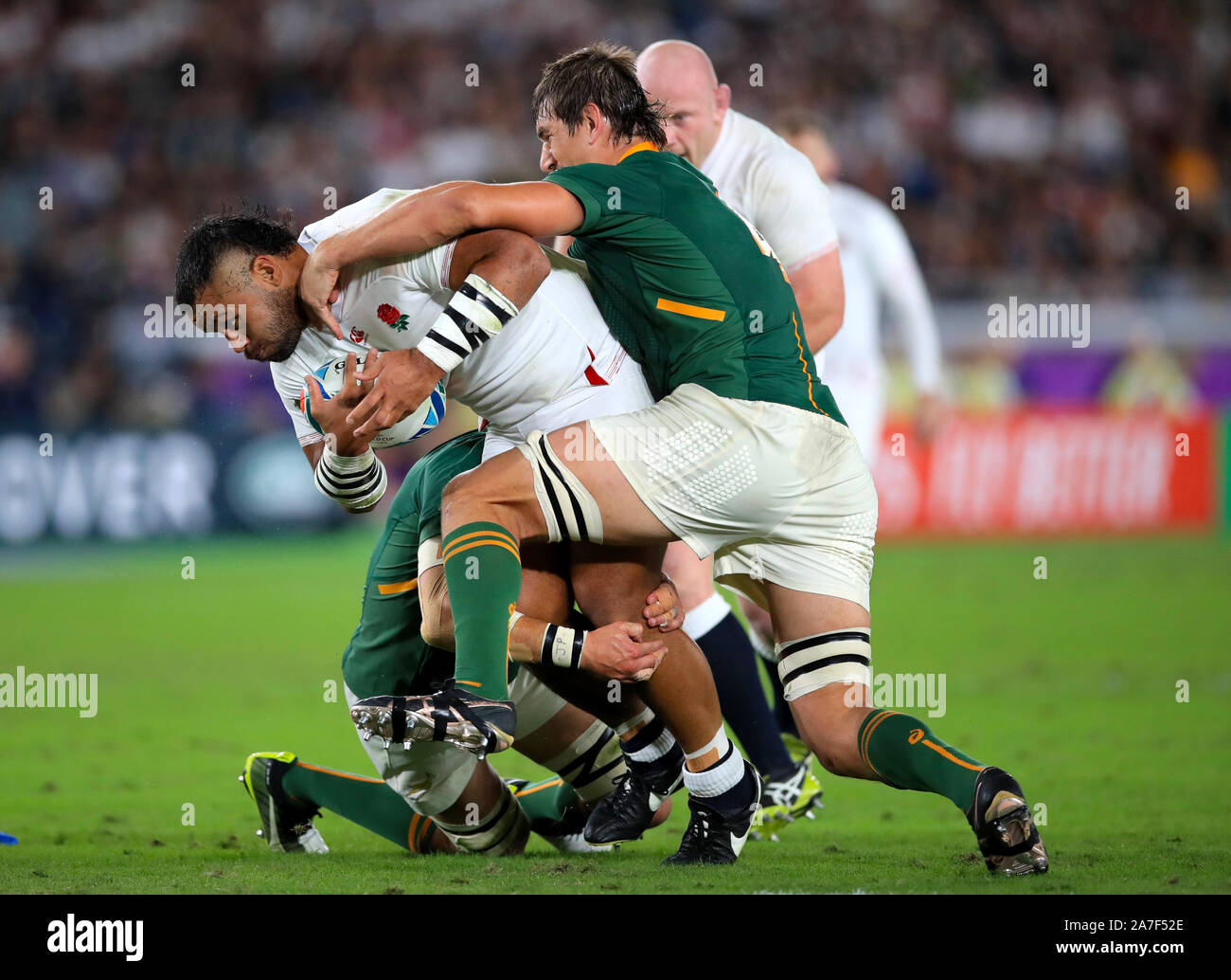 England's Billy Vunipola (left) is challanged by South Africa's Eben ...