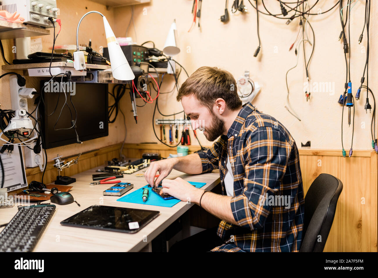 Repairman desk hi-res stock photography and images - Alamy