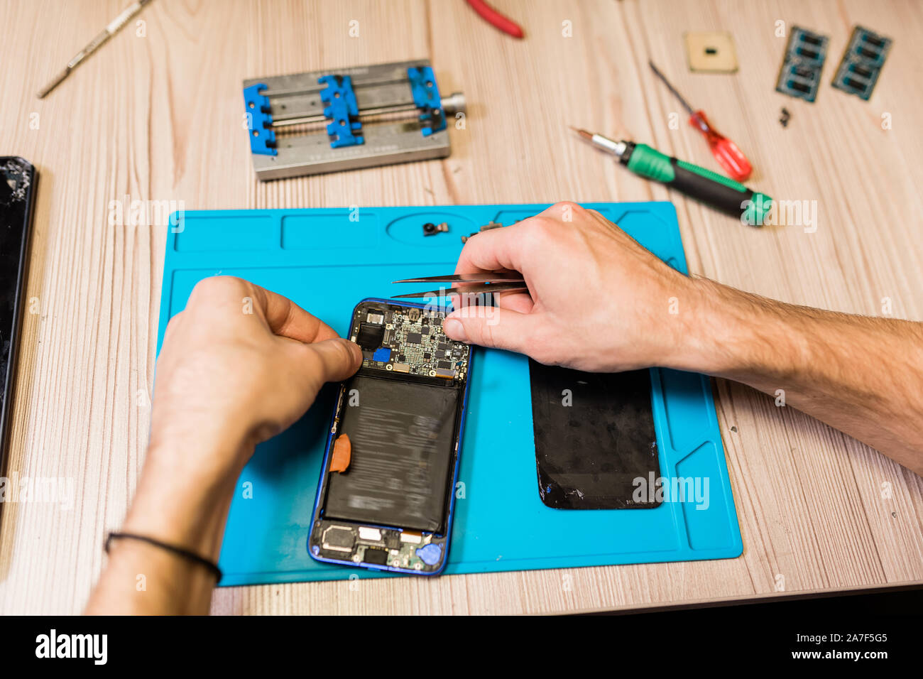 Human repairing hi-res stock photography and images - Alamy