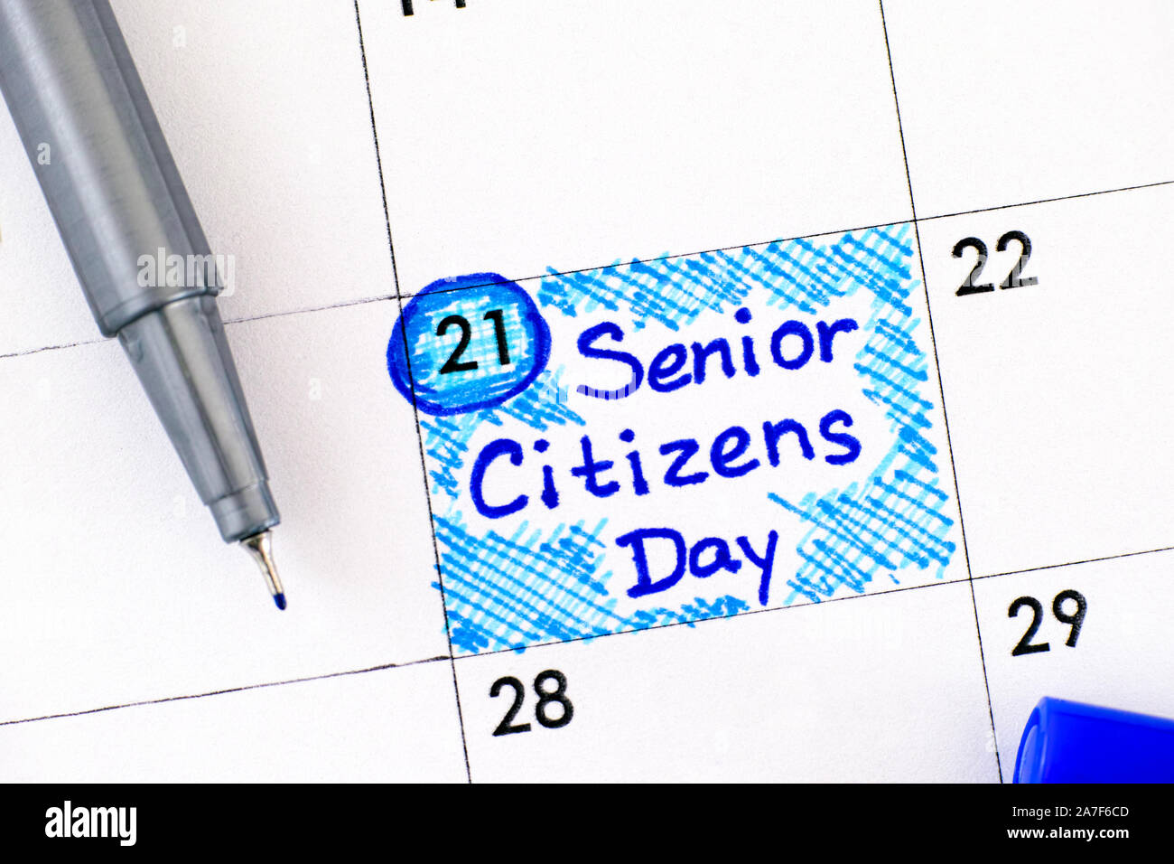 Reminder Senior Citizens Day in calendar with blue pen. August 21st ...