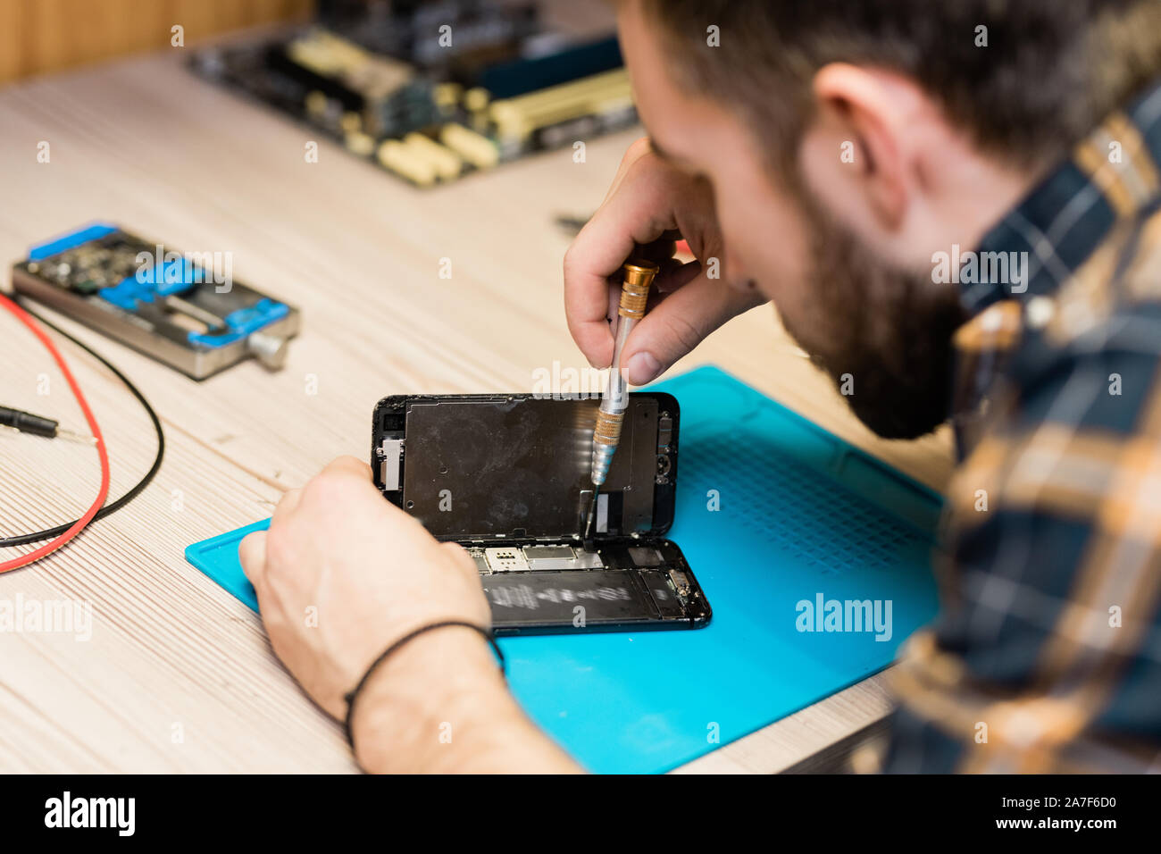 Tiny people fixing computer hi-res stock photography and images - Alamy