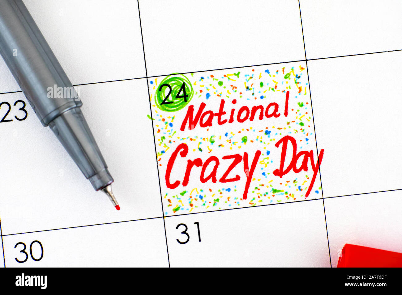 Reminder National Crazy Day in calendar with red pen. October 24 Stock ...