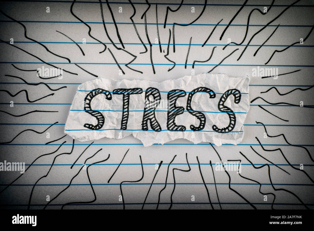The word Stress on a lined paper. Close up Stock Photo - Alamy